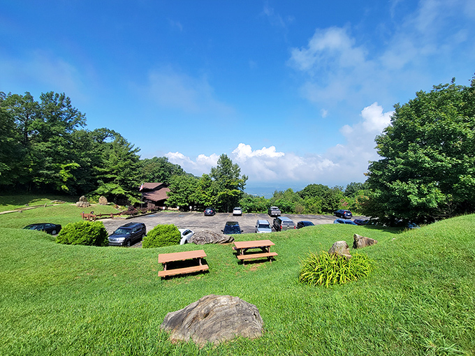 Nothing says "adventure awaits" quite like a perfectly ordinary parking lot that promises extraordinary underground wonders just ahead.