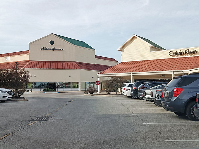 Retail therapy row featuring Eddie Bauer and Calvin Klein. The unassuming exterior hides fashion treasures at prices that make splurging feel surprisingly responsible.