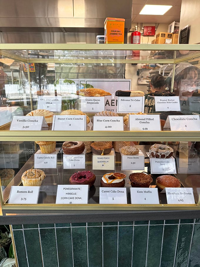 A pastry display that should come with a warning label: "May cause spontaneous joy and the inability to choose just one."