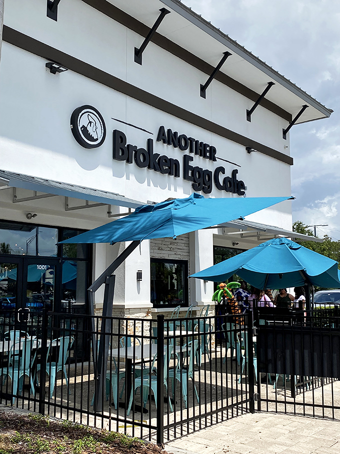 The patio offers al fresco breakfast therapy under those cheerful teal umbrellas. Florida sunshine and waffles&mdash;name a better duo.