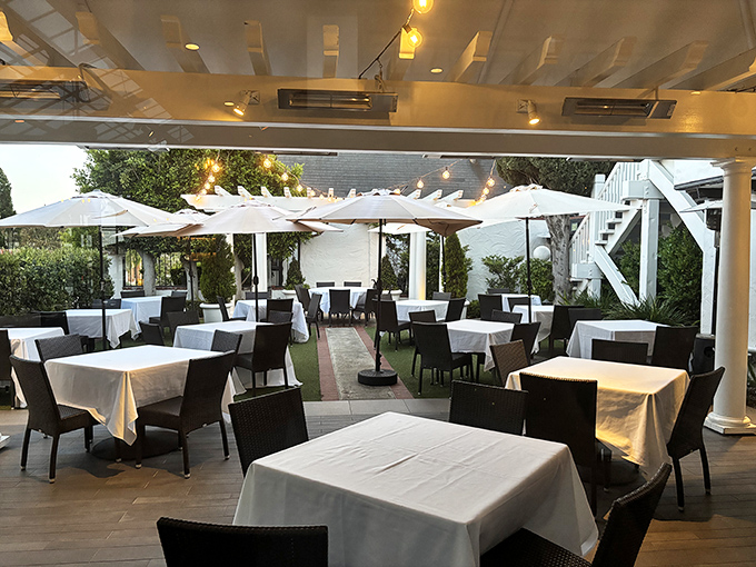 Al fresco dining California-style: where perfect weather meets perfect service under umbrellas that have witnessed countless celebrations.