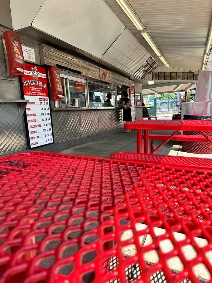 Red tables under open skies&mdash;Philadelphia's most democratic dining room. The conversation between strangers here is as good as the food.