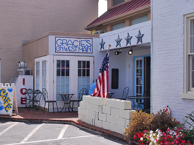 The welcoming patio entrance, complete with American flag, feels like the front porch of that friend who always feeds you too well.