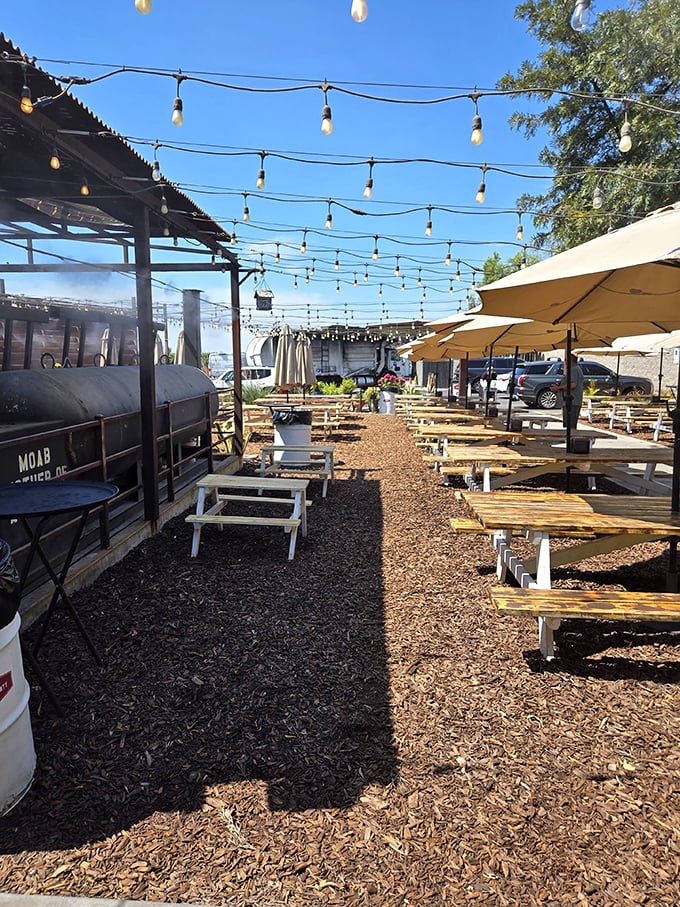 Wood chips underfoot and string lights overhead&mdash;the journey to your picnic table feels like walking the red carpet to Flavortown.
