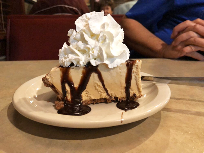 Peanut butter pie with chocolate drizzle and whipped cream&mdash;dessert's way of saying "You've made an excellent life choice today."