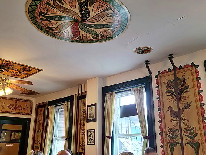 Ceiling medallions and hanging tapestries showcase traditional Pennsylvania Dutch folk art&mdash;visual appetizers that feed your eyes while you wait for your meal.