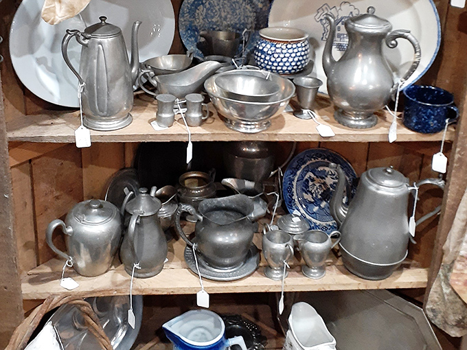 Silver and pewter treasures waiting to be polished back to glory&mdash;each piece holding memories of formal dinners and special occasions.