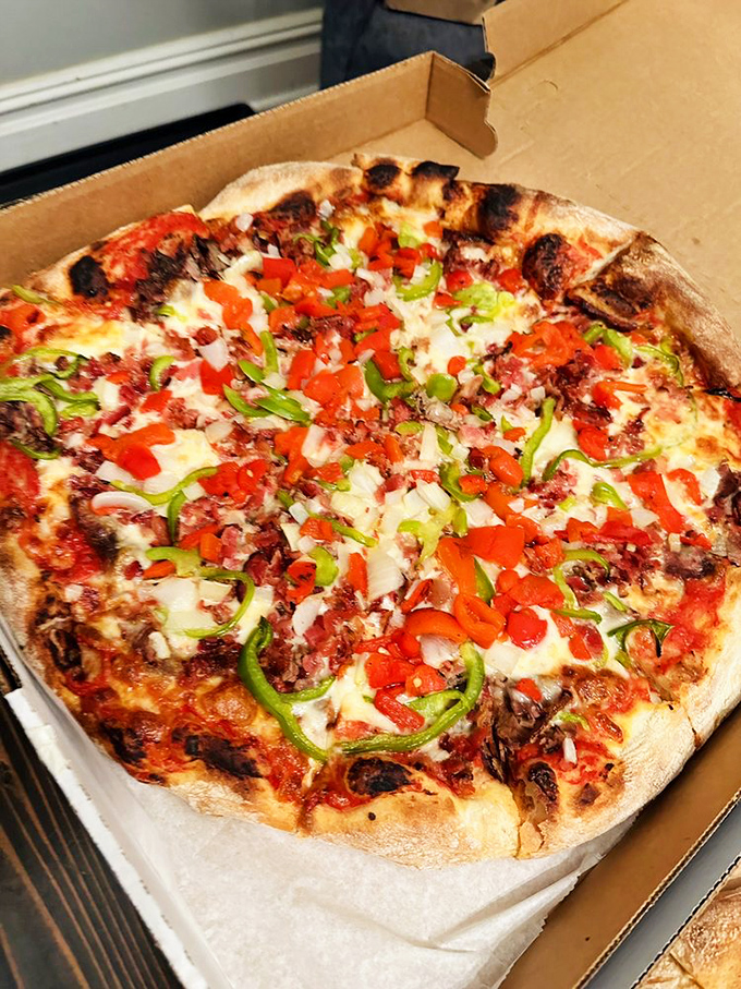 A symphony of colors and textures&mdash;the Philly steak pizza combines two regional favorites in one glorious, cheese-blanketed masterpiece.