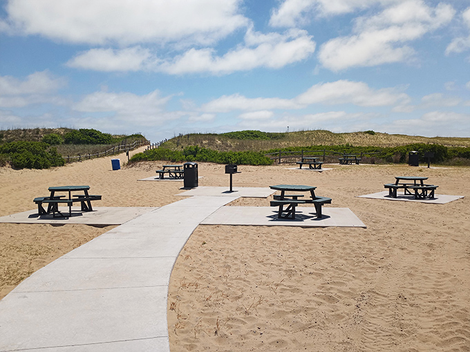 Picnic tables strategically placed for optimal beach viewing &ndash; because lunch with a side of ocean panorama simply tastes better.