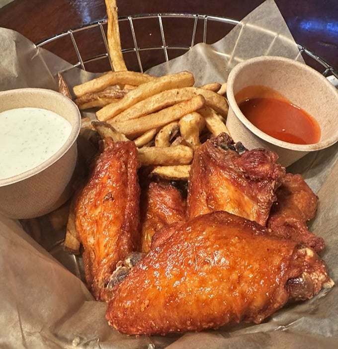 Wings that don't need fancy tricks to impress—just perfectly crisp skin, juicy meat, and dipping sauces worth fighting over. Napkins required, not optional.