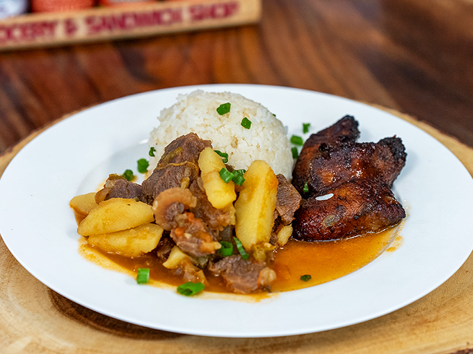A plate that proves comfort food transcends language barriers &ndash; rice, meat, and plantains speaking the universal tongue of delicious.