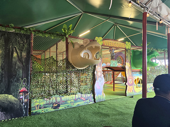 Jungle-themed play area where kids can burn off energy while parents debate whether they really need that fifth bag of mangoes.