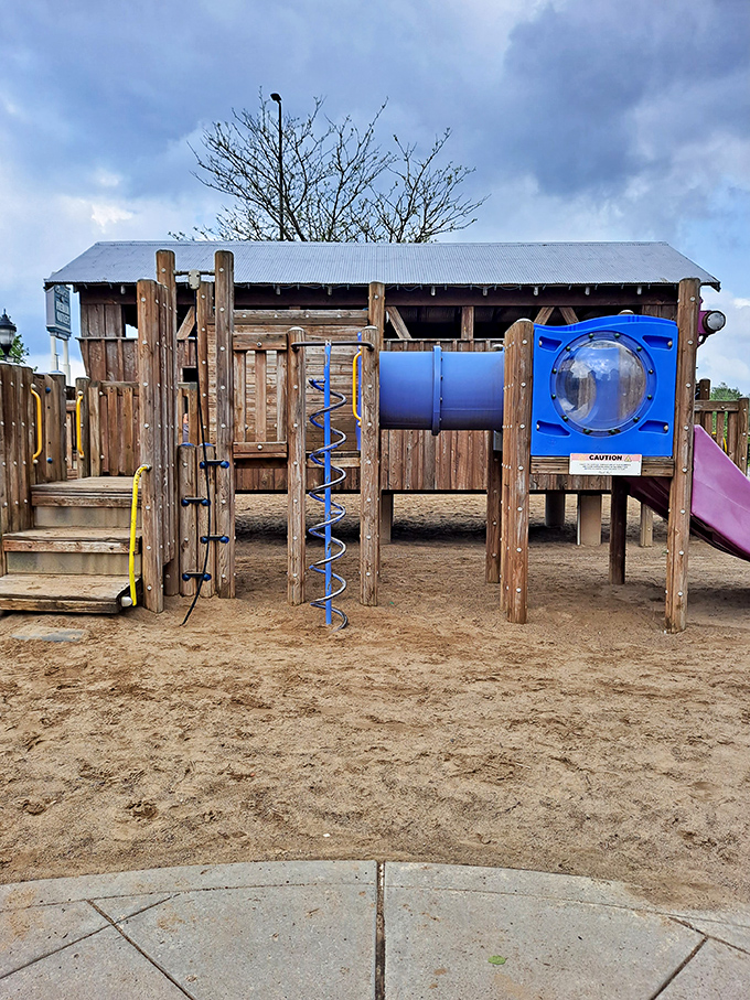 The playground oasis&mdash;where children burn energy while parents contemplate burning through their credit limit.