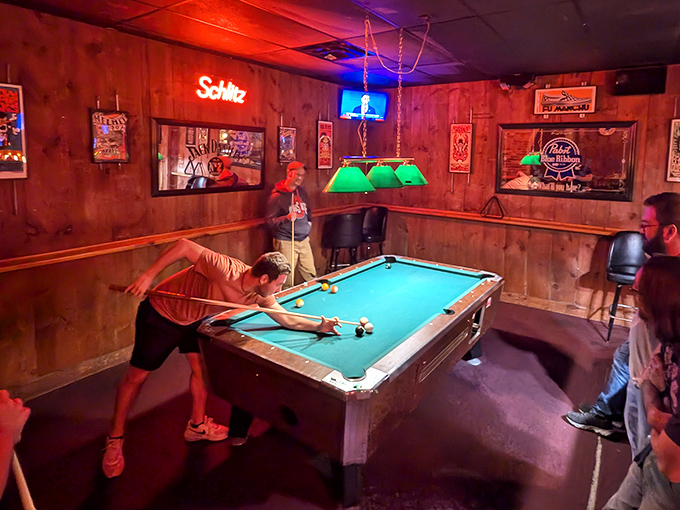 Even the pool table room maintains that classic Hounddog's vibe &ndash; wood paneling, neon signs, and the promise of friendly competition.