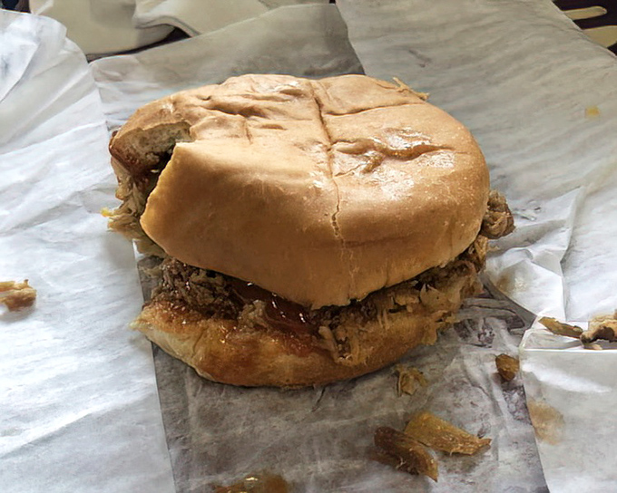 The Chopped Pork Sandwich doesn't need fancy presentation &ndash; just a soft bun struggling heroically to contain a mountain of savory meat.