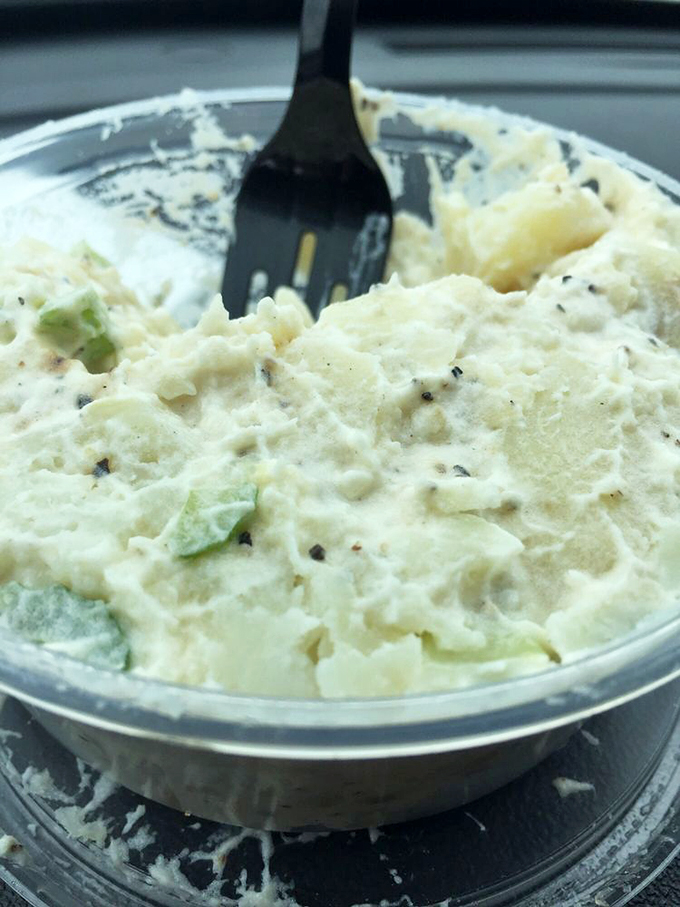 This isn't just potato salad&mdash;it's a creamy, herb-flecked side dish that refuses to be overshadowed by its sandwich companions. The perfect supporting actor.