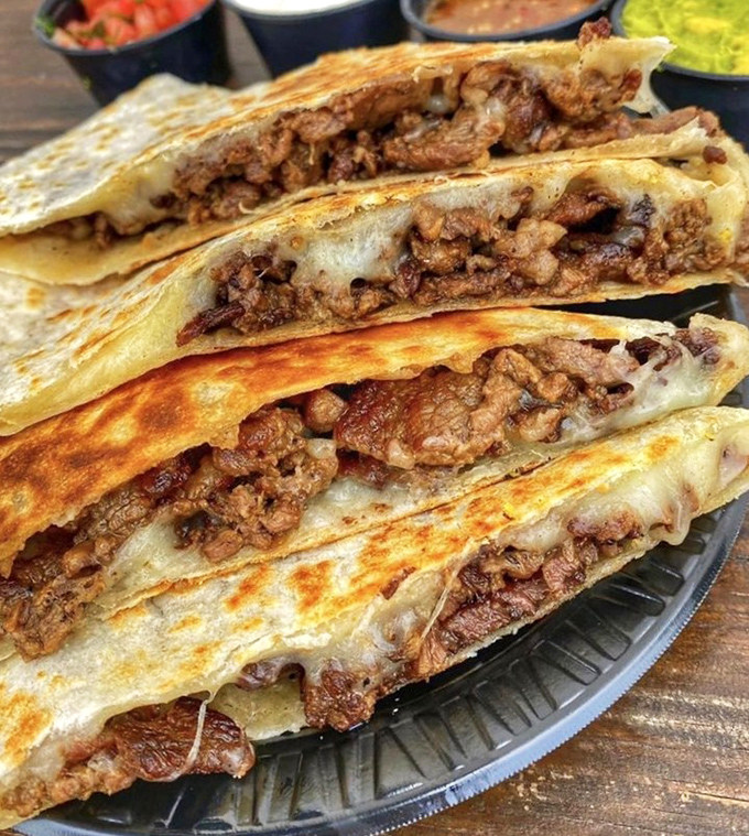 Layers of melted cheese and seasoned meat create a quesadilla that's less snack and more declaration of love to Mexican street food.