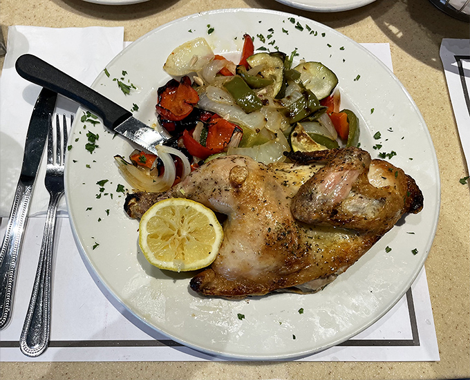 Roasted chicken that looks like it just posed for its glamour shot. Those vegetables aren't side dishes&mdash;they're supporting actors in a delicious drama.