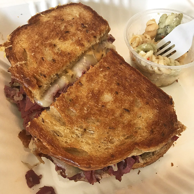 A perfectly grilled sandwich that makes a compelling argument for lunch at breakfast time. That melty cheese is speaking a language everyone understands.