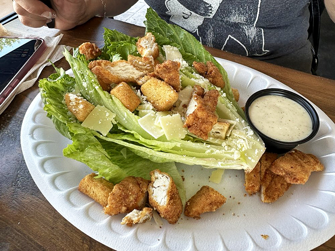 A Caesar salad that Julius himself would cross the Rubicon for. Those golden nuggets of chicken are the crown jewels of this leafy kingdom.