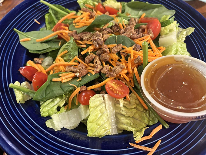 "A garden salad that doesn't apologize for being simple &ndash; fresh ingredients letting you reset your palate between seafood indulgences."