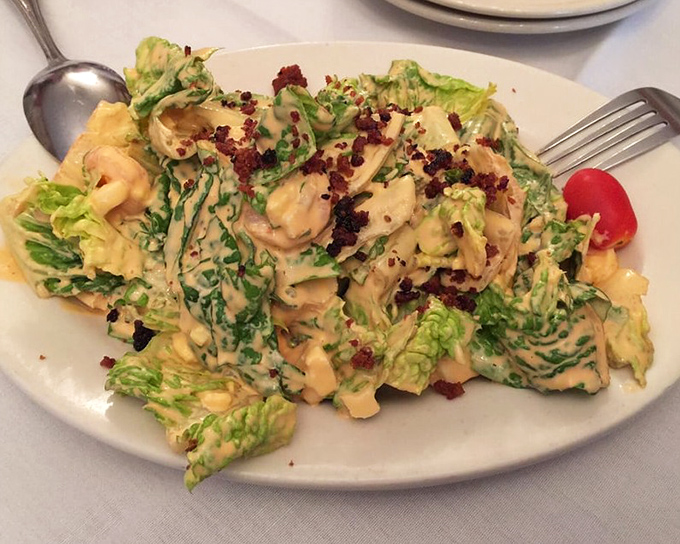 A salad that knows its supporting role&mdash;crisp, creamy, and ready to refresh your palate between bites of pasta. Those bacon bits aren't messing around.