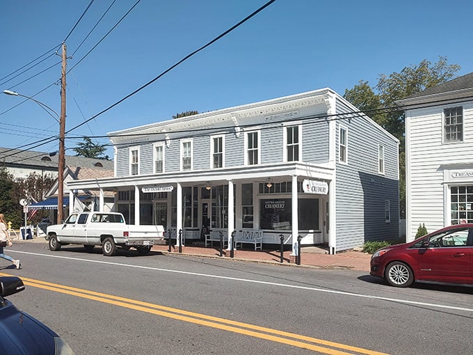 The Scottish Highland Creamery occupies a classic blue storefront that practically whispers, "Your diet doesn't apply while you're on vacation."