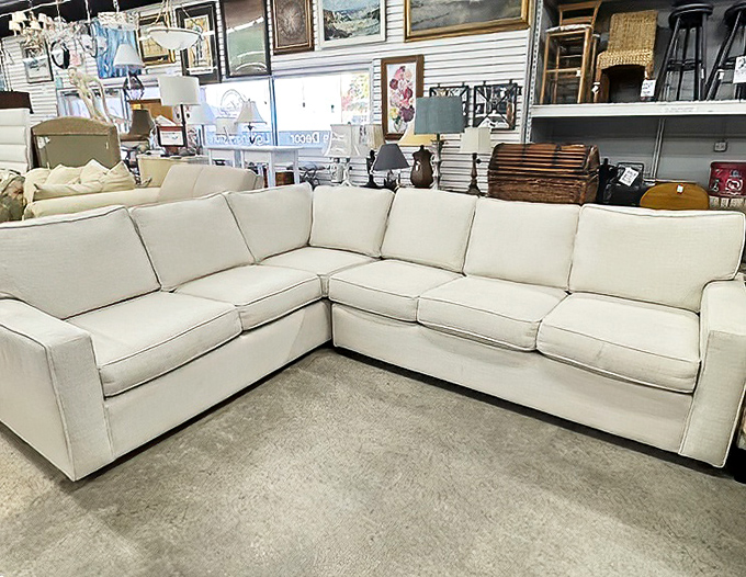 The white sectional: proof that someone else's redecorating whim can become your living room's new best friend at a fraction of retail price.