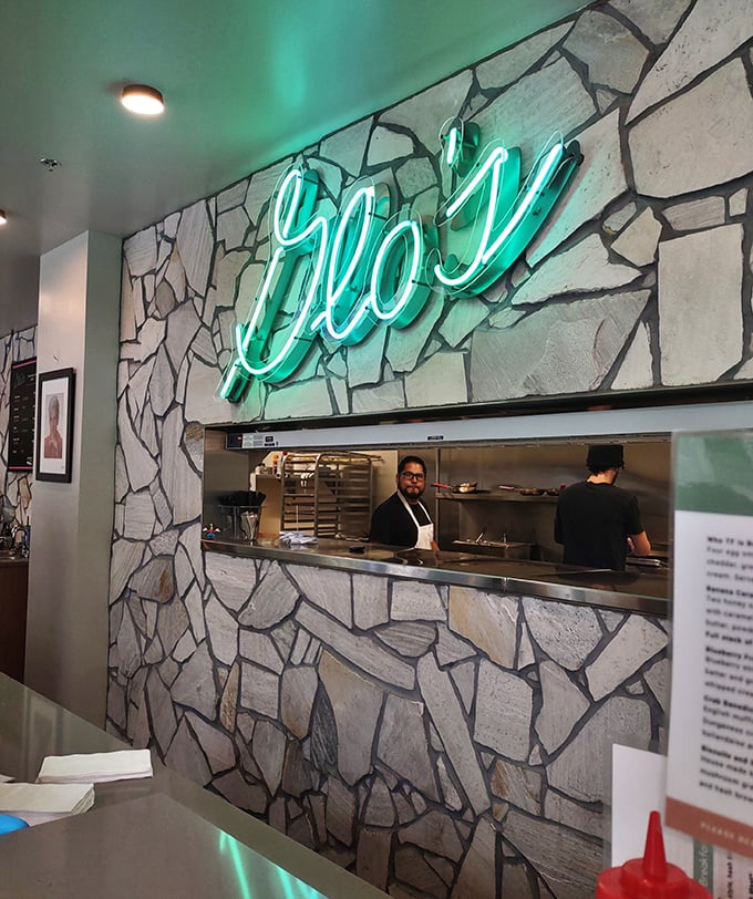 Behind this pass-through window, breakfast wizards work their morning magic, transforming simple ingredients into the benedicts that launch a thousand Instagram posts.