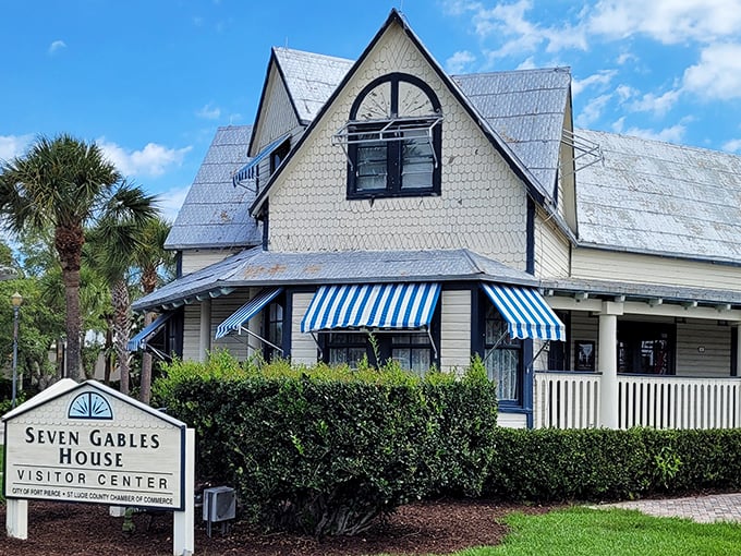 Seven Gables House wears its Victorian charm with blue-and-white striped awnings &ndash; architectural eye candy from an era when houses had personality to spare.