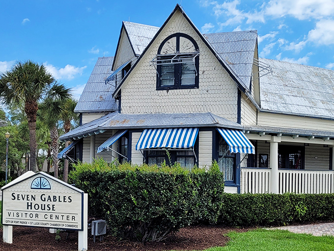 Seven Gables House wears its Victorian charm with blue-and-white striped awnings &ndash; architectural eye candy from an era when houses had personality to spare.