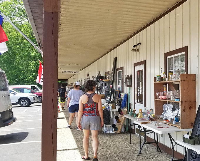 The treasure hunt continues outside! Even on sunny days, the covered porch becomes part of the antiquing adventure at Logan Antique Mall.