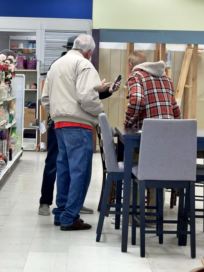 Serious furniture shoppers consulting on potential purchases. That dining set might be exactly what they've been hunting for all month.