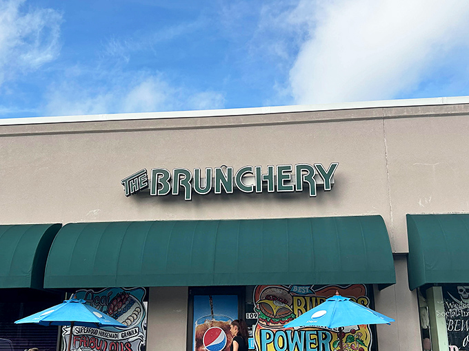 The Brunchery sign stands proud against the Florida sky, like a landmark that should be included on Tampa tourism maps.
