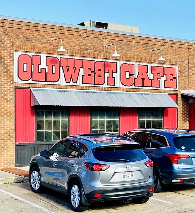 The bold red signage against brick announces without pretension: serious comfort food happens here, no reservations or fancy attire required.