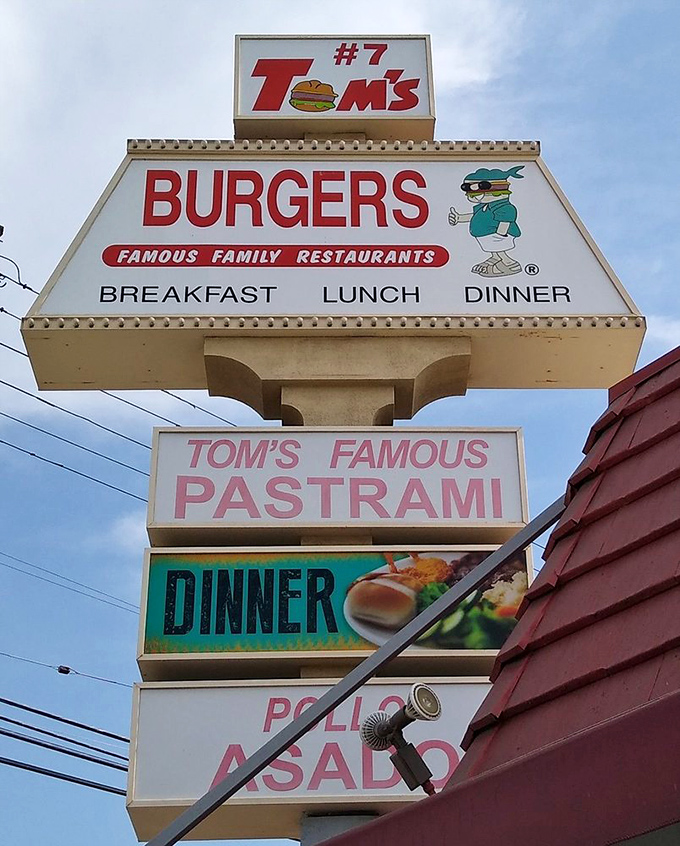 The sign promises three essential meals and famous pastrami. Like all great advertising, it makes a promise that the food inside eagerly fulfills.