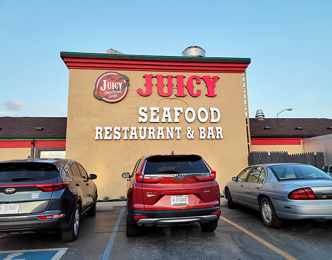 The bold "JUICY SEAFOOD" signage doesn't whisper its presence—it announces it proudly, like a town crier for crustacean delights.