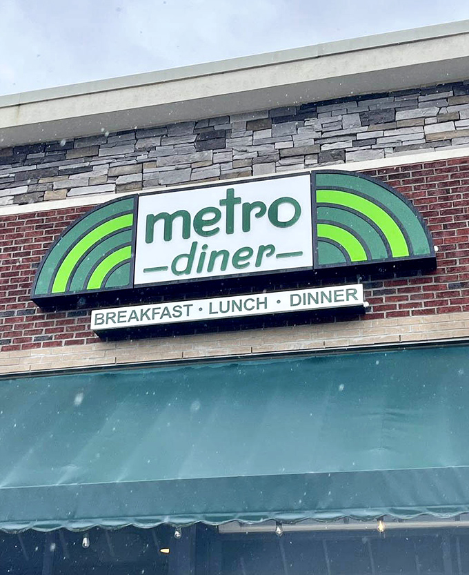 Even in snowfall, the Metro Diner sign glows with warm invitation. Bad weather never stopped good appetite.