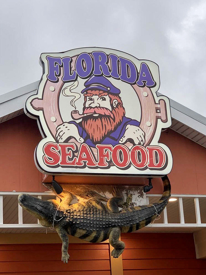 The captain of this culinary ship keeps watch from the sign &ndash; his pipe presumably filled with seafood seasoning and Florida sunshine.