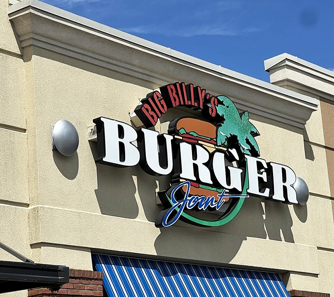 The sun casts dramatic shadows behind that iconic sign&mdash;nature's way of highlighting your next meal destination.