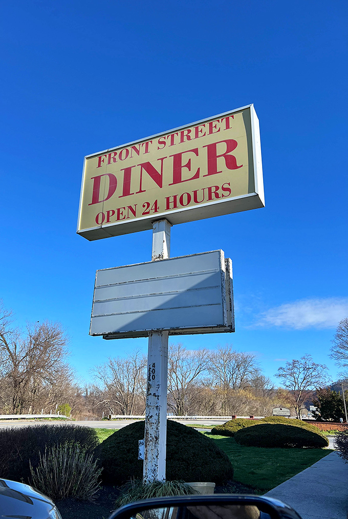 The sign against a perfect blue Pennsylvania sky &ndash; like a North Star for hungry travelers seeking authentic diner experiences.