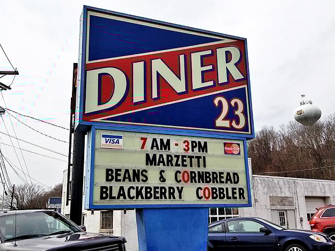 The roadside sign announces hours and daily specials like a town crier. When it says "Blackberry Cobbler," that's not a suggestion&mdash;it's a command.