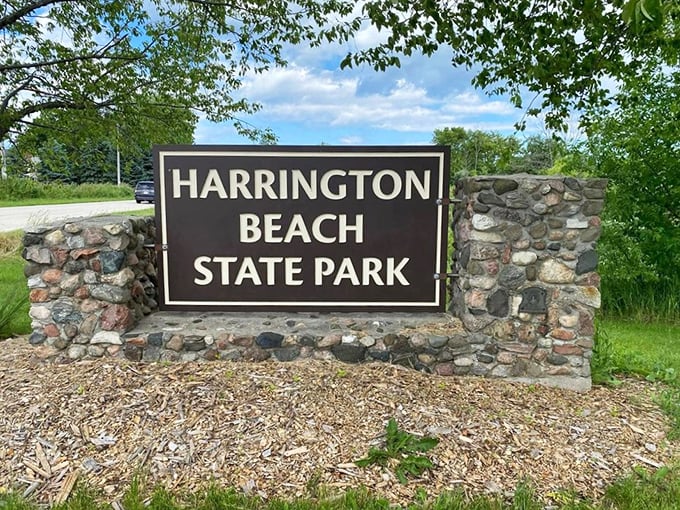 The park's entrance sign, crafted from local stone, announces you've arrived somewhere special. Nature's VIP section awaits beyond.