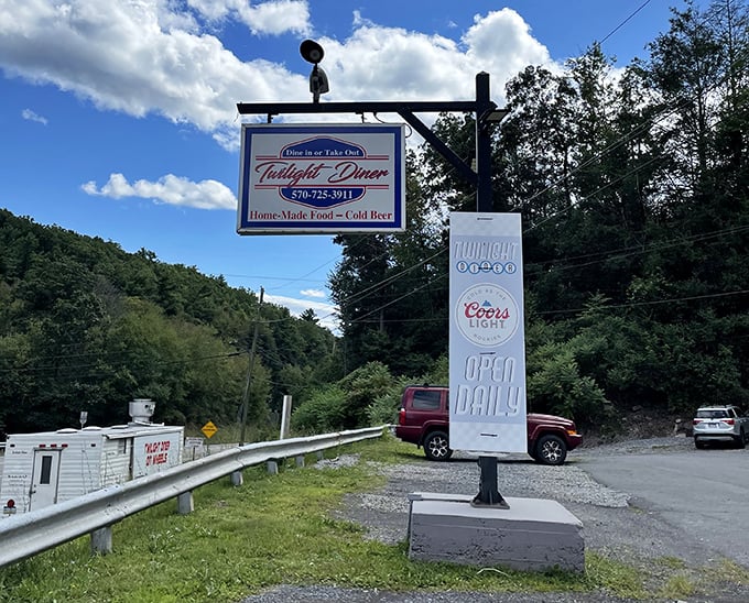 The roadside sign stands like a lighthouse for hungry travelers&mdash;"Home-Made Food" isn't just a slogan, it's a solemn vow.