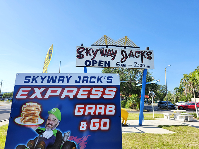 The roadside sign announces "GRAB & GO" with cartoon flair, but trust me&mdash;you'll want to linger over whatever breakfast treasures you find inside.
