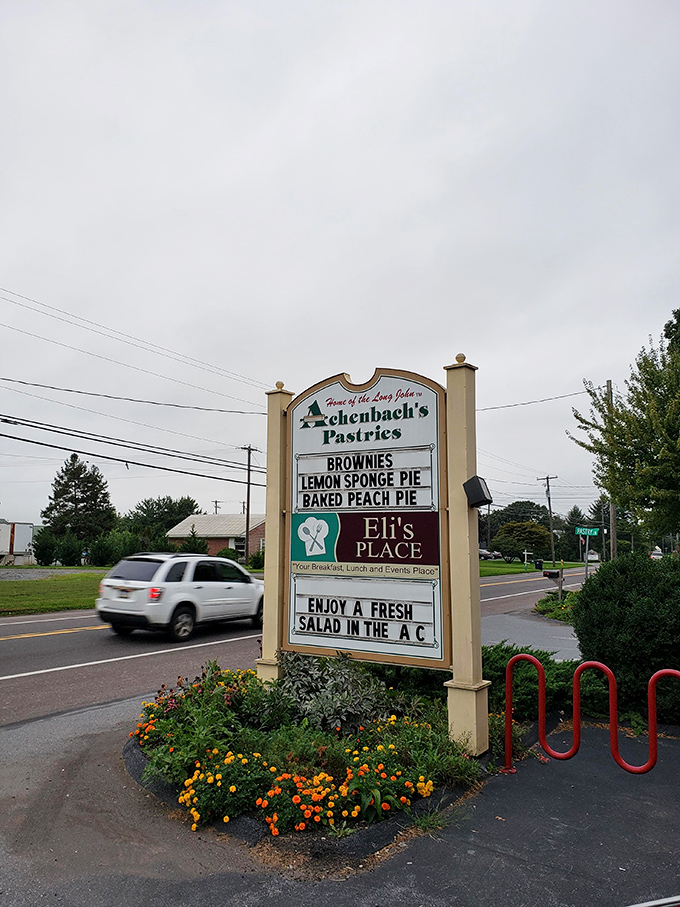 The roadside sign announces today's stars: brownies, lemon sponge pie, and peach pie. In the bakery world, this is the equivalent of a Hollywood marquee.