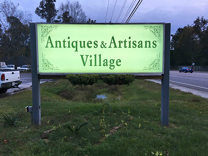 The illuminated sign glows like a lighthouse for vintage-hunters navigating the sea of mass-produced sameness. Follow the green light!