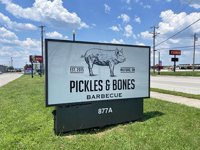 The roadside sign announces your arrival at meat paradise. Simple, straightforward, and doing exactly what it needs to do&mdash;guiding hungry souls home.