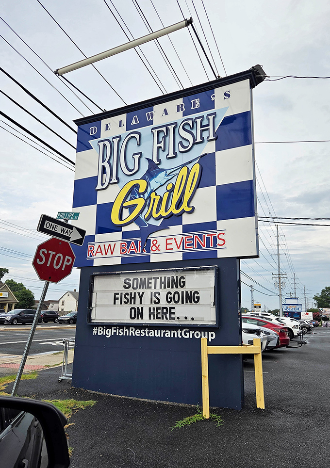 Even the roadside sign knows something fishy is happening here, and that's exactly the point.
