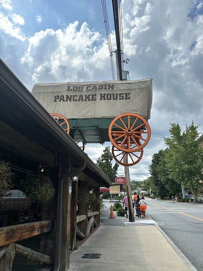 That covered wagon sign isn't just cute&mdash;it's a beacon of hope for hungry travelers, promising pioneer-sized portions that would make Daniel Boone proud.